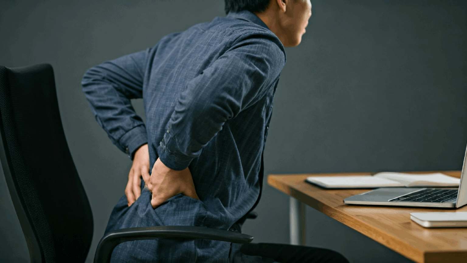 6 Best Sitting Positions for Lower Back Pain - Nivaan Care - Pain ...